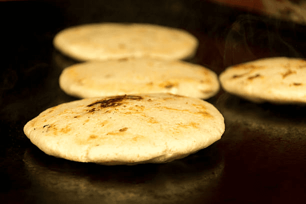 Pupusas, Pupas, Papusas: All About the Names of this Delicious Delight