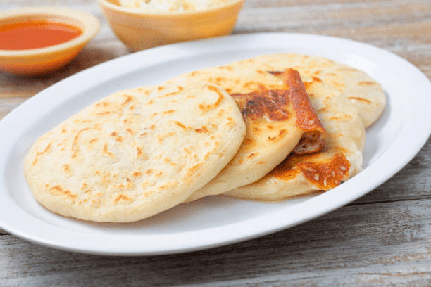 How Have Pupusas Been Adapted in the United States?